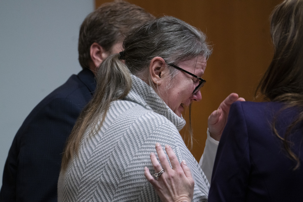 Prosecutor tells jury that mother of Michigan school shooter is at ...